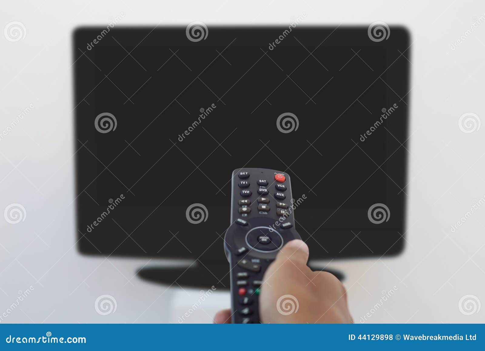 Hand Holding Remote and Changing Channel Stock Photo - Image of studio ...