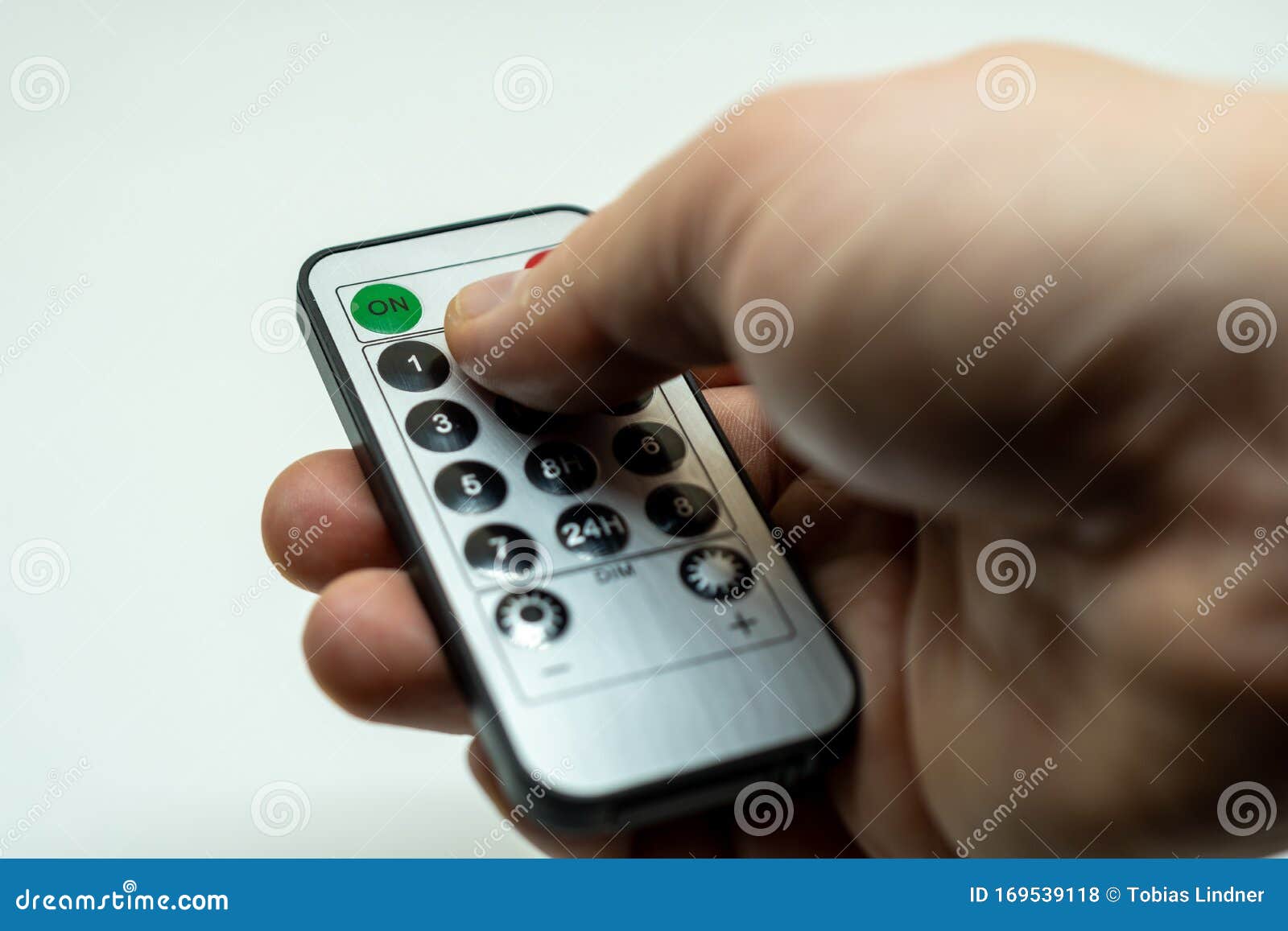 Hand Holding Remote Control Isolated on White Stock Photo - Image of ...