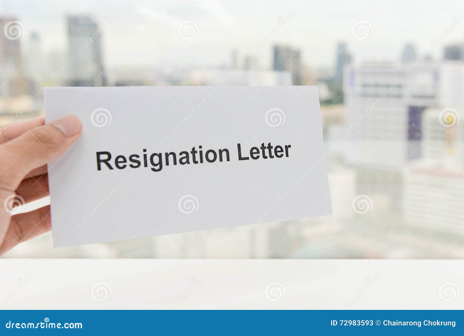Hand is Holding the Resignation Letter Stock Image - Image of hand ...