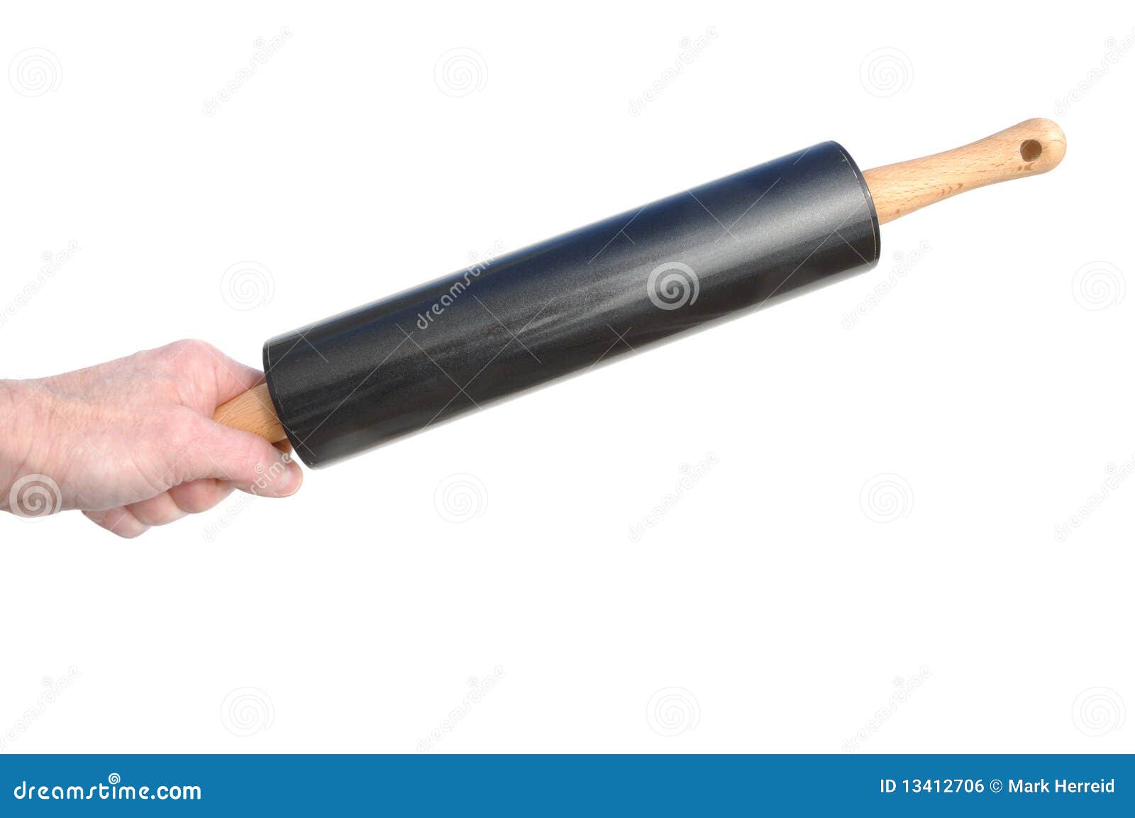 Hand Holding a Rolling Pin stock photo. Image of white - 13412706