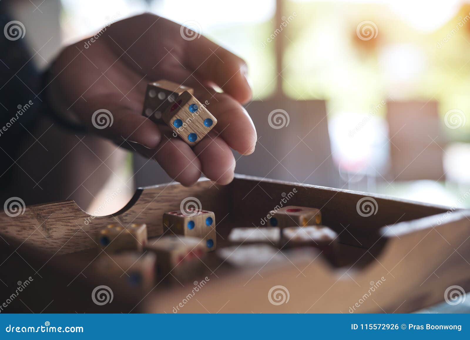 Hand Holding and Rolling Wooden Dices Stock Photo - Image of cube, luck ...