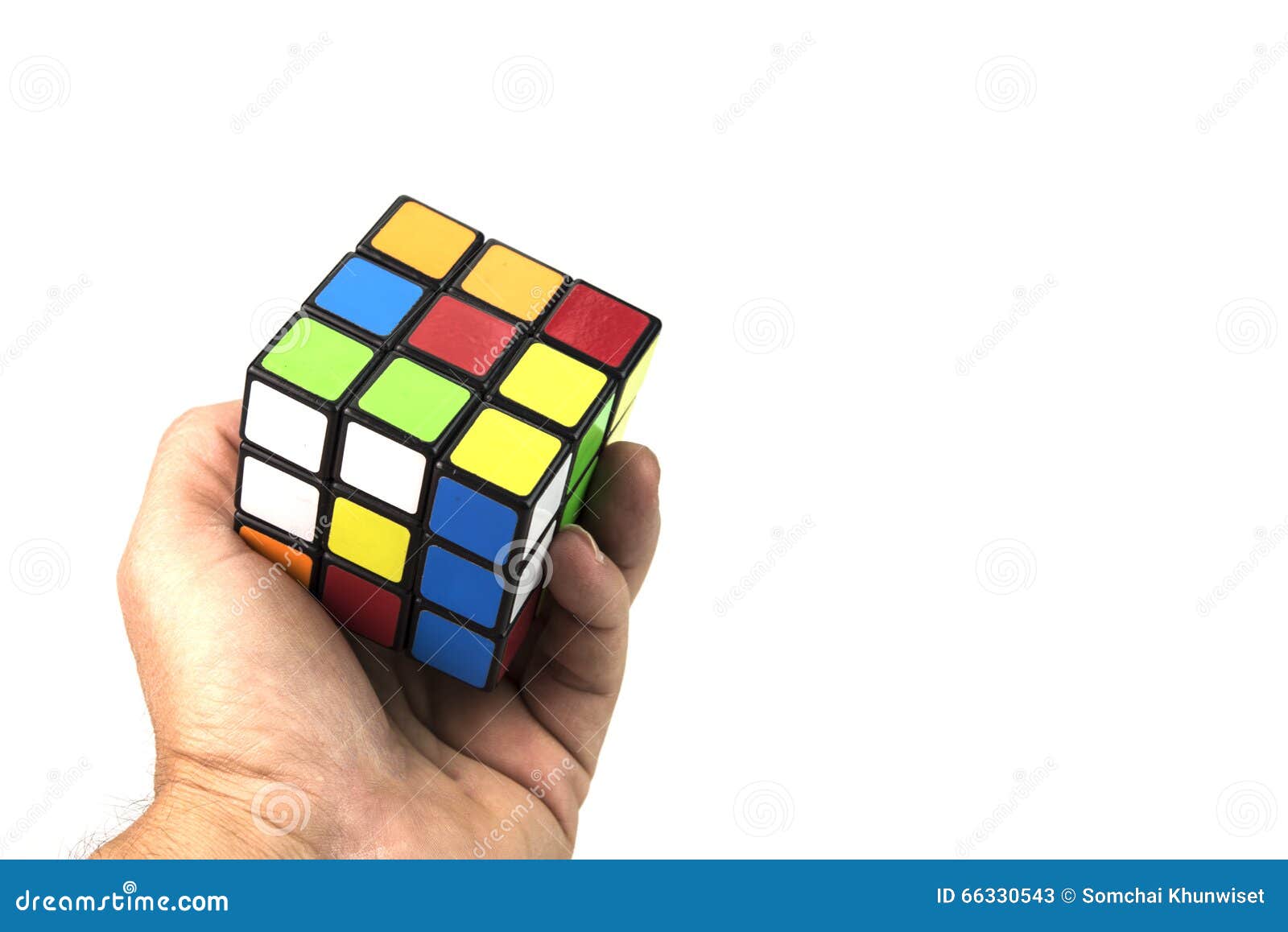 Hand holding rubik editorial stock photo. Image of white - 66330543