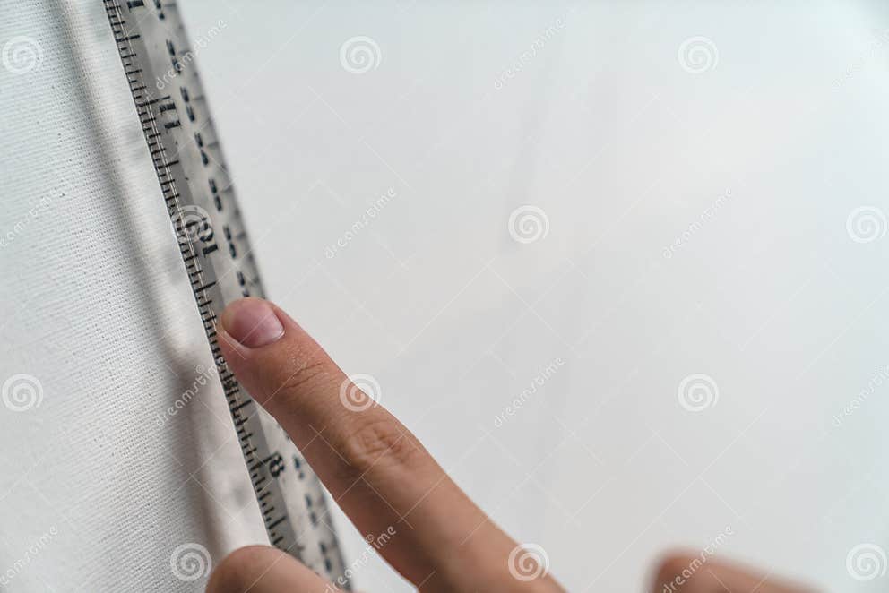 Hand Holding Ruler with Canvas Background Stock Image - Image of ...