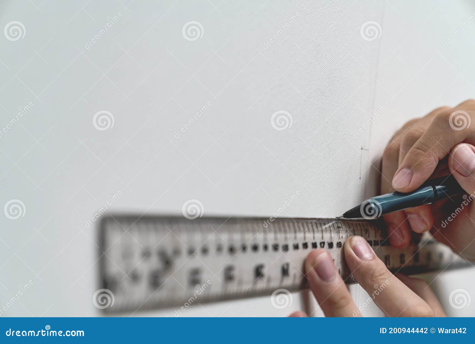 Hand Holding Ruler and Clutch-type Pencil with Canvas Background Stock ...