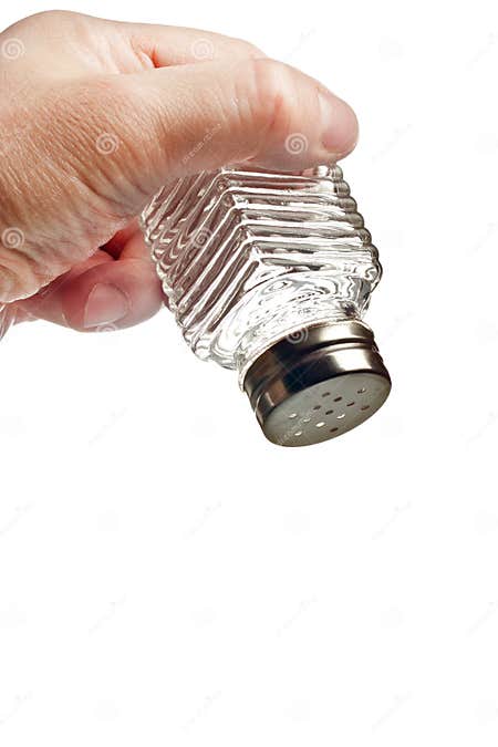 Hand holding salt shaker stock photo. Image of saltcellar - 17831270