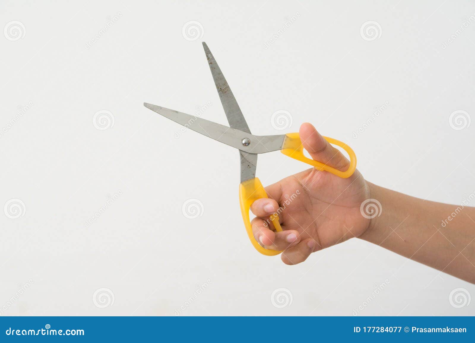Hand holding a scissors stock image. Image of hand, object - 177284077