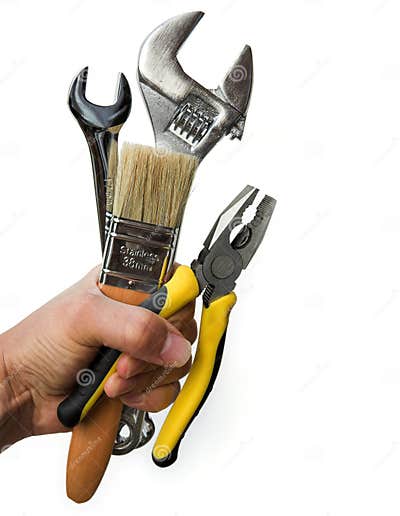Hand Holding a Selection of Tools Stock Photo - Image of shiny ...