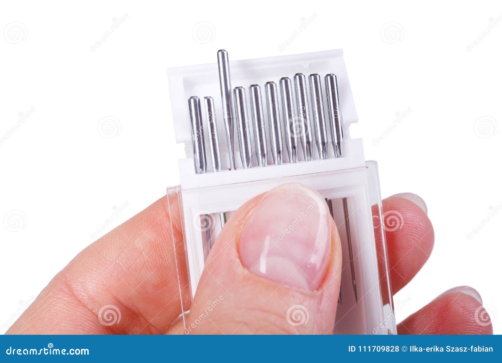 Hand Holding Set of Sewing Machine Needles Stock Photo - Image of ...