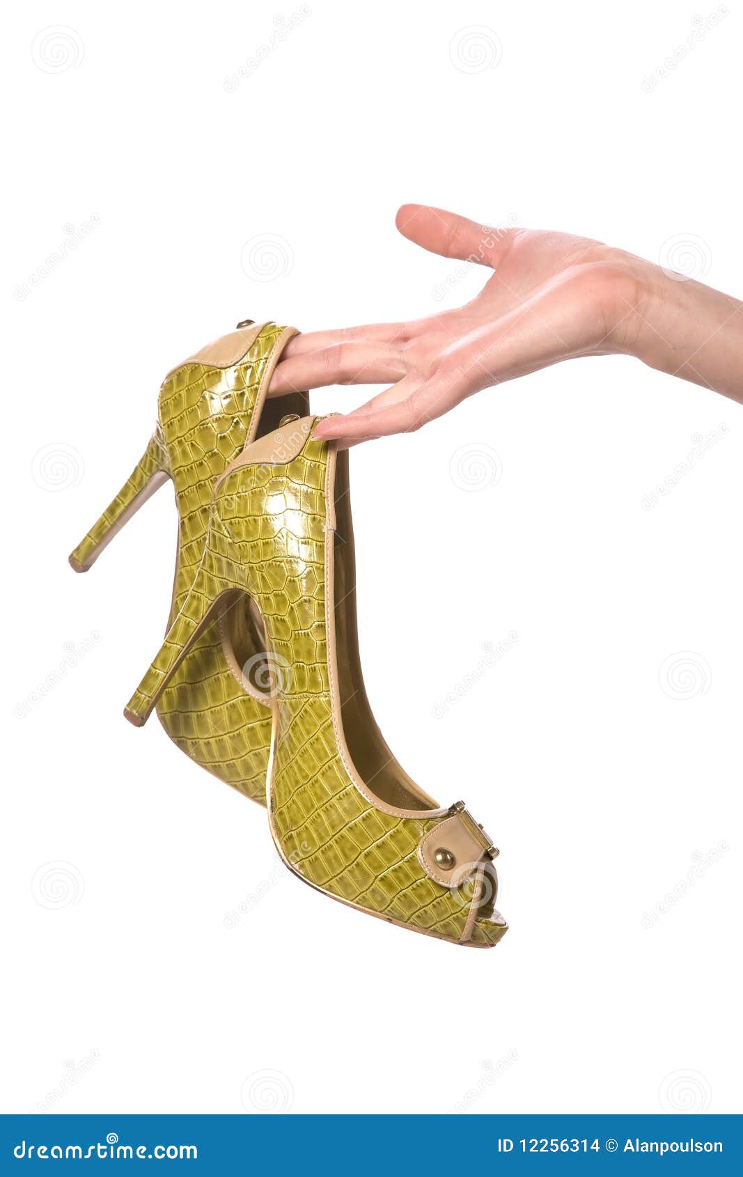 Hand holding shoes stock photo. Image of haircut, eyelashes - 12256314