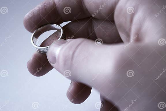 Hand holding a silver ring stock photo. Image of hand - 18661692