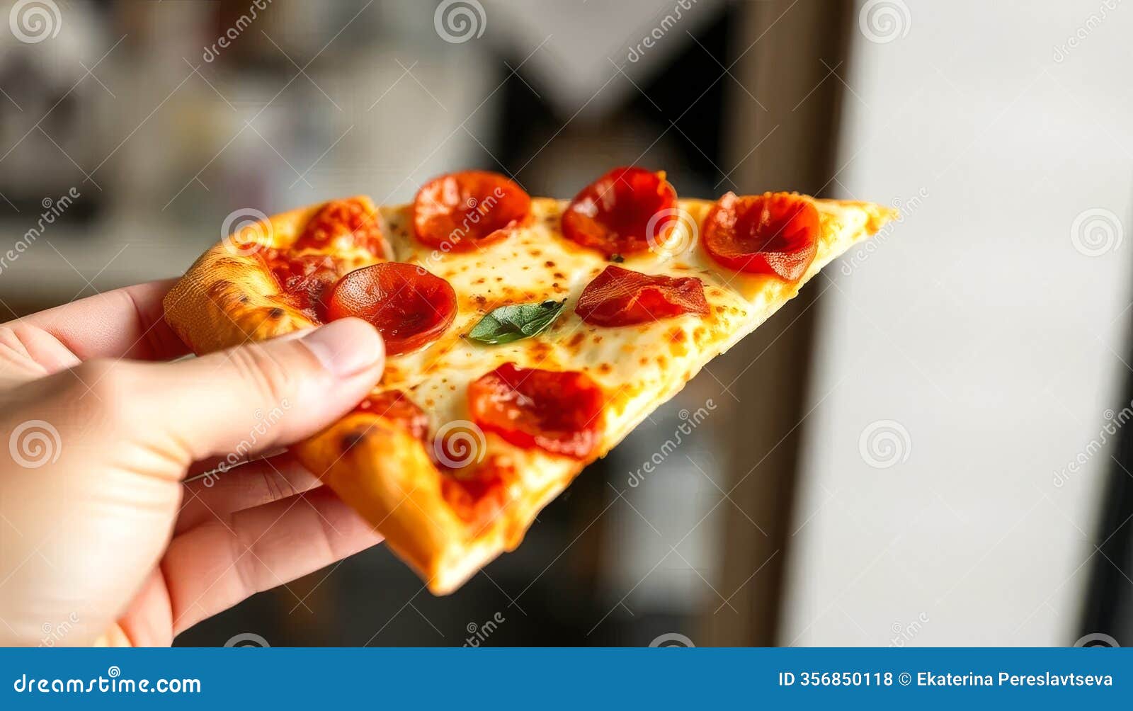 Hand Holding a Slice of Pepperoni Pizza Stock Photo - Image of closeup ...