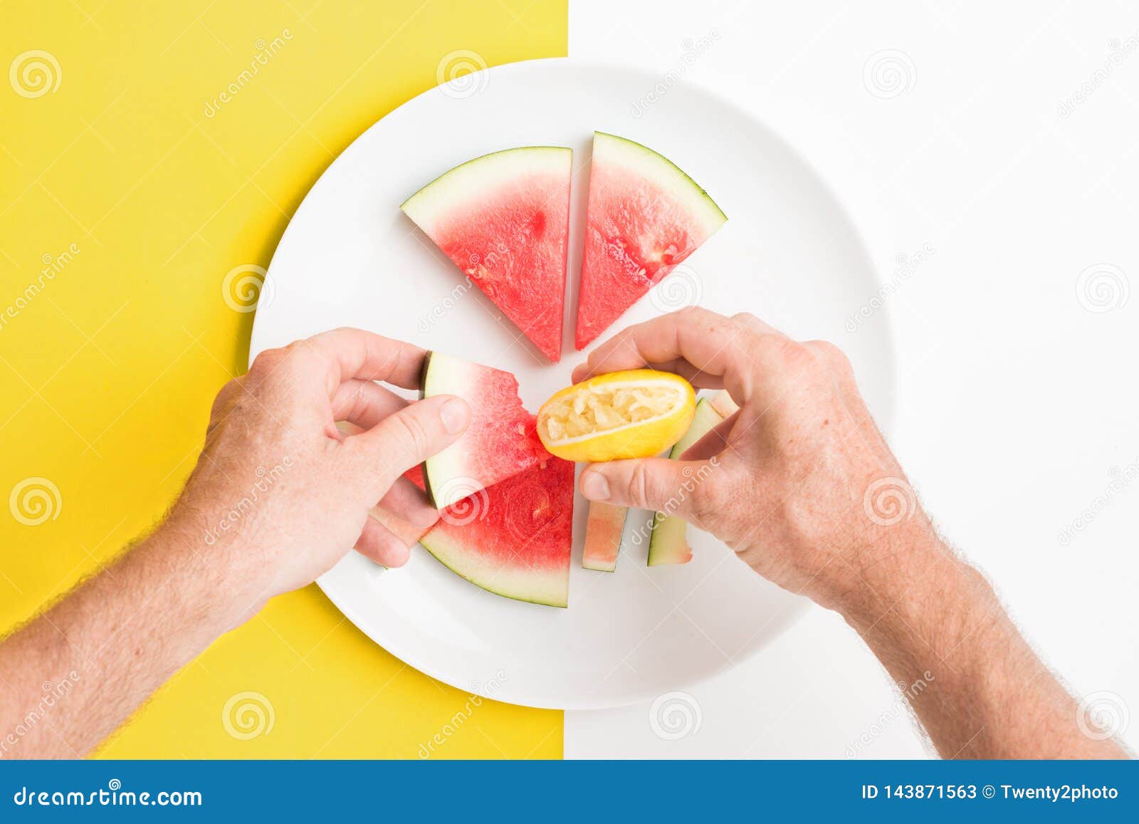 Hand Holding Slice of Watermelon about To Squeeze Lemon Over it Stock ...