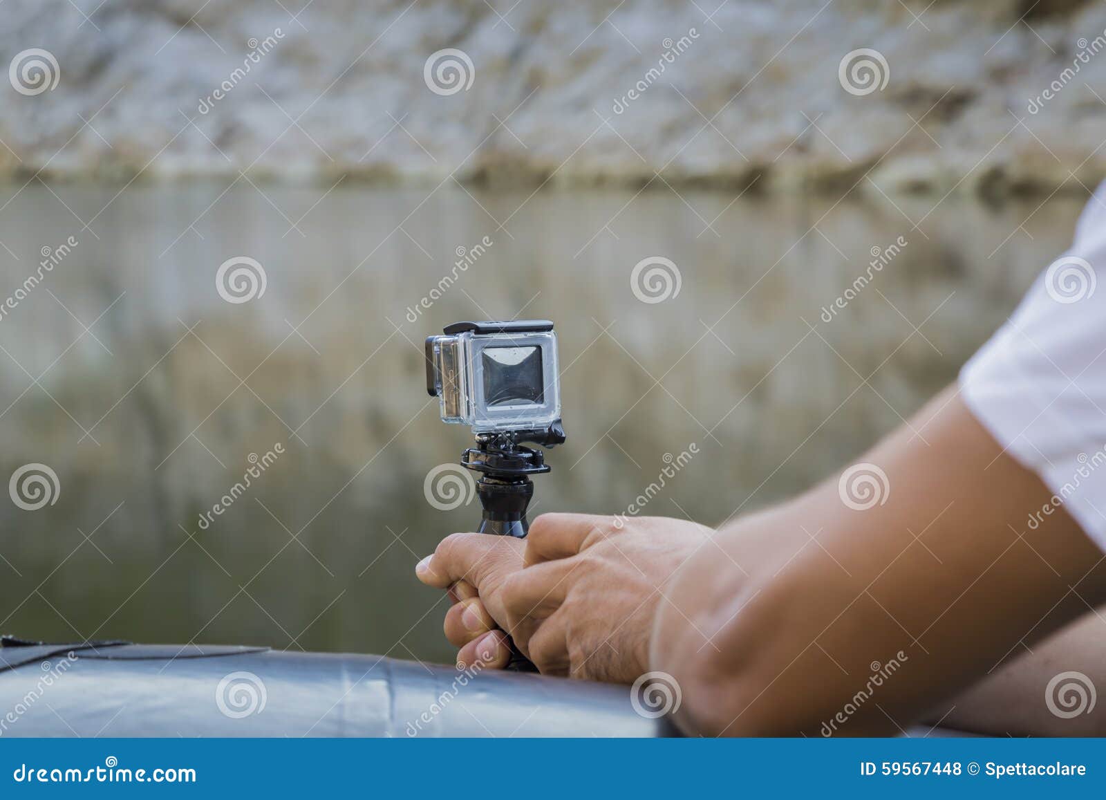 Hand Holding Small Action Camera with Waterproof Case Stock Photo ...