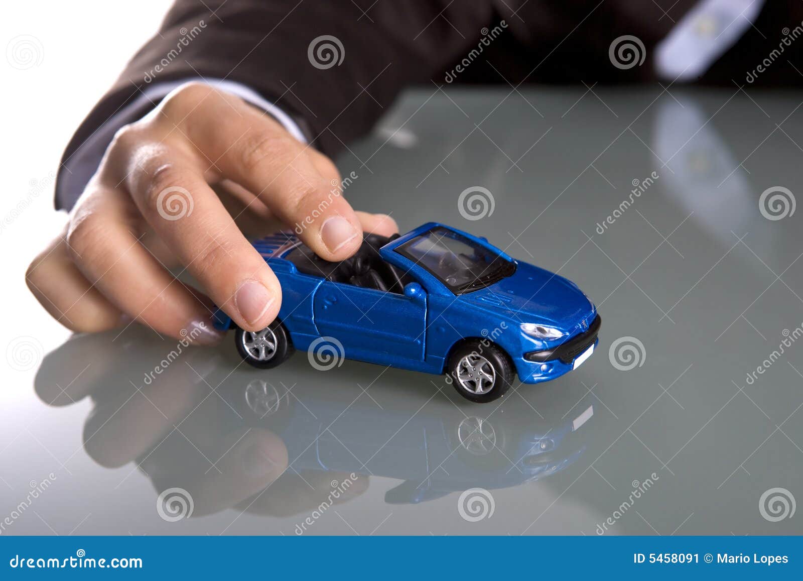 Hand Holding Small Blue Car Stock Image - Image of object, hold: 5458091