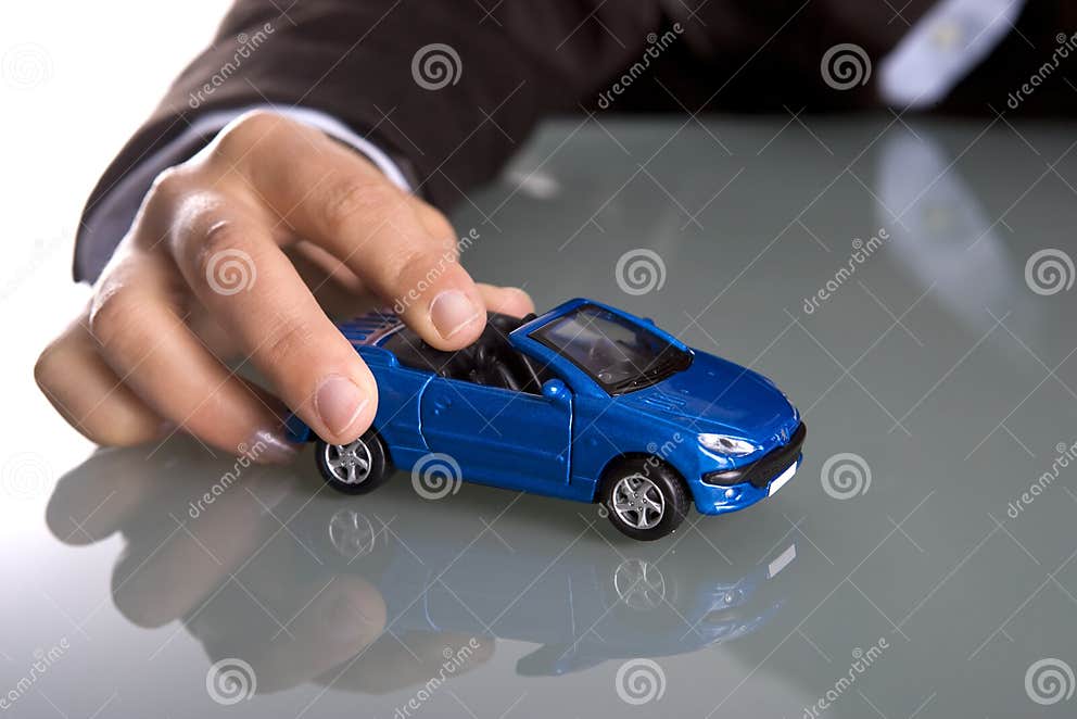 Hand Holding Small Blue Car Stock Image - Image of object, hold: 5458091