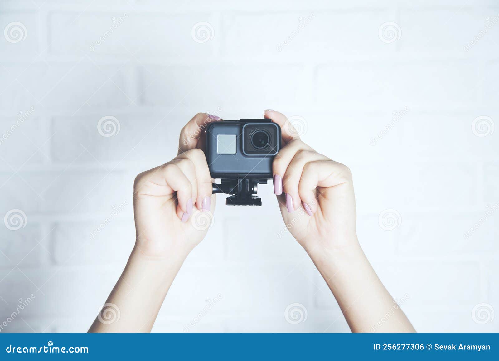 Hand holding small camera stock photo. Image of digital - 256277306