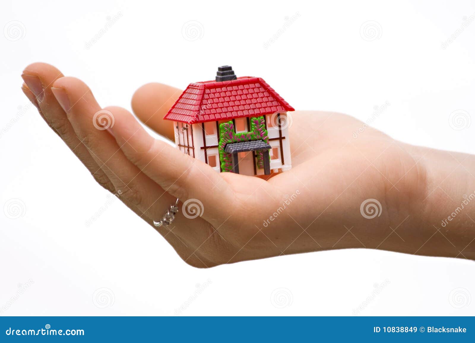 Hand holding small house stock image. Image of build - 10838849