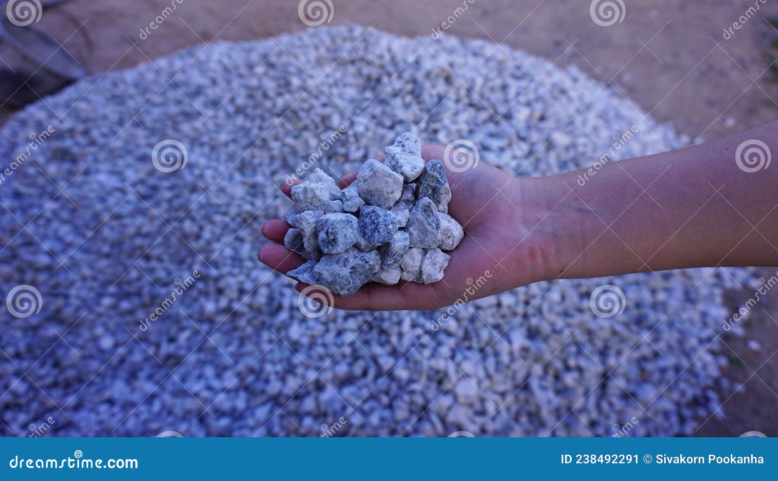 Hand Holding a Small Stone for Use in Construction Stock Image - Image ...