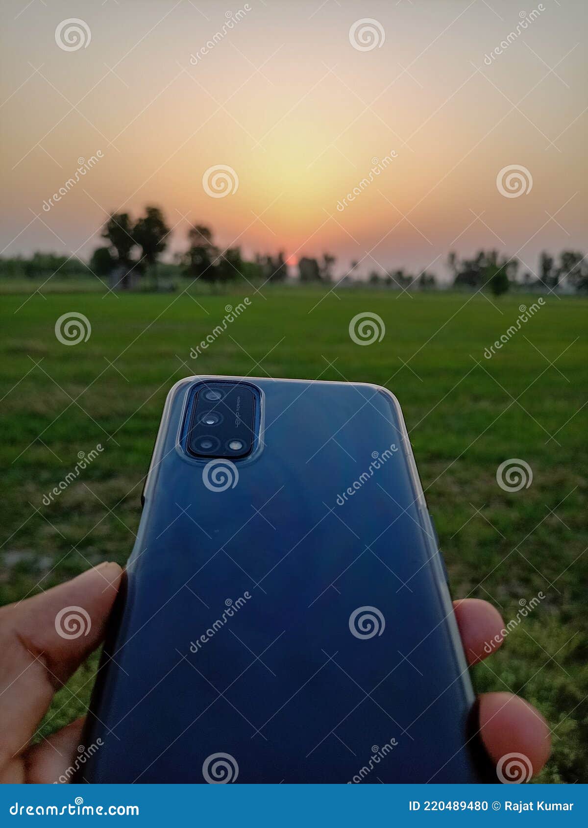 Hand holding Smart Phone stock photo. Image of screenshot - 220489480