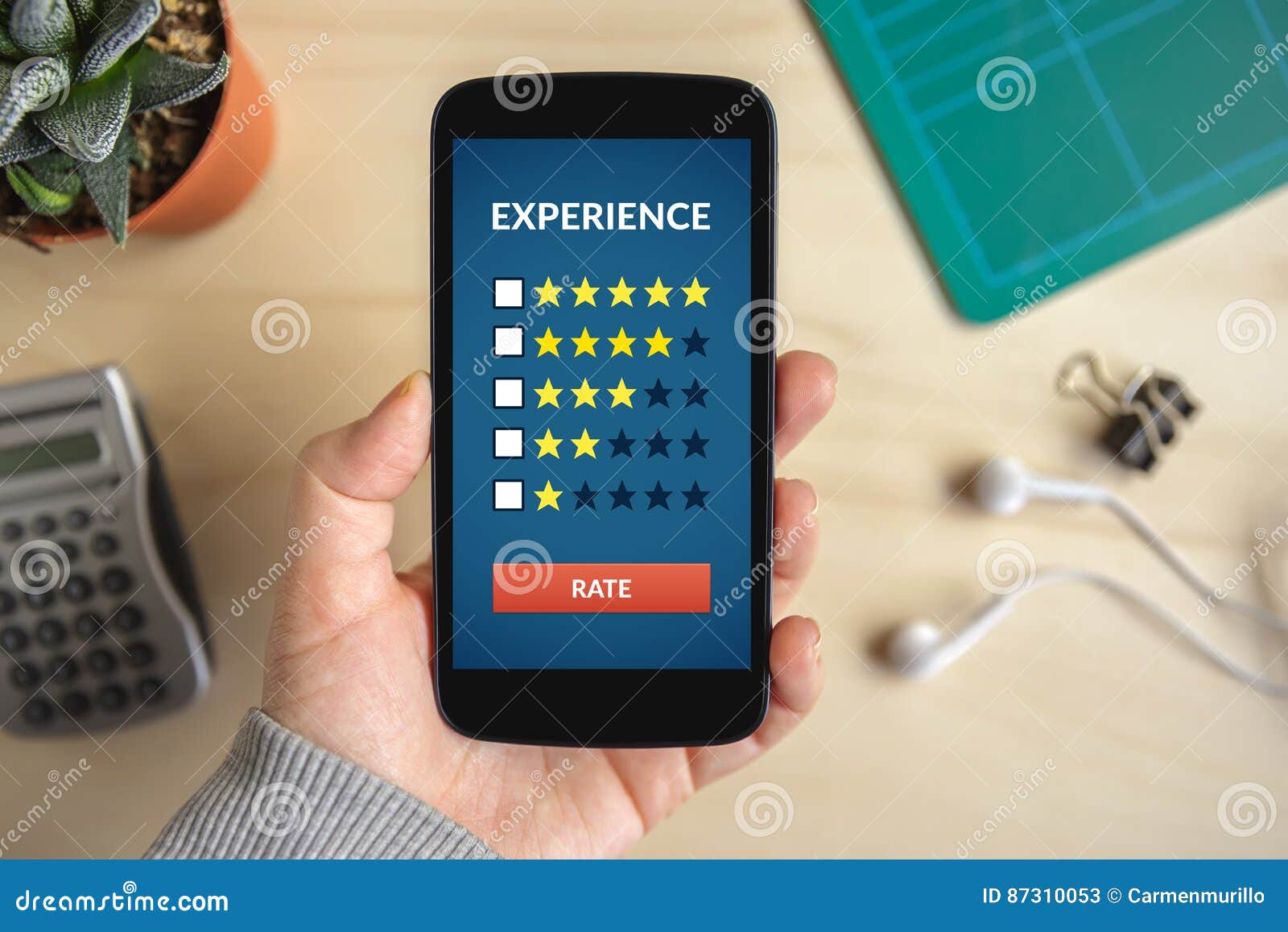 Hand Holding Smart Phone with Customer Experience Concept on Screen ...