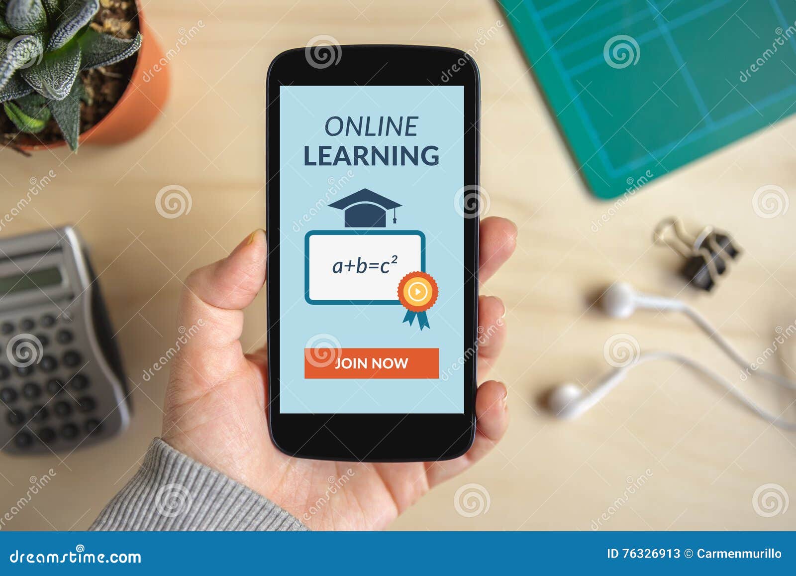 Hand Holding Smart Phone with Online Learning Concept on Screen Stock ...