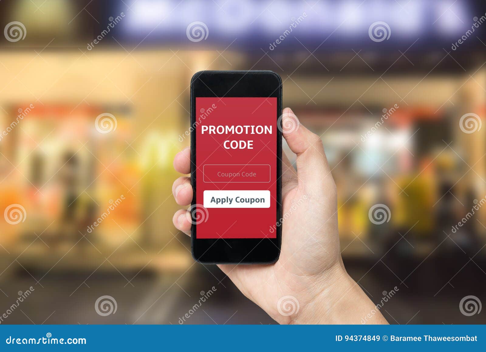 Hand Holding Smart Phone with Promotion Code Application Stock Image ...