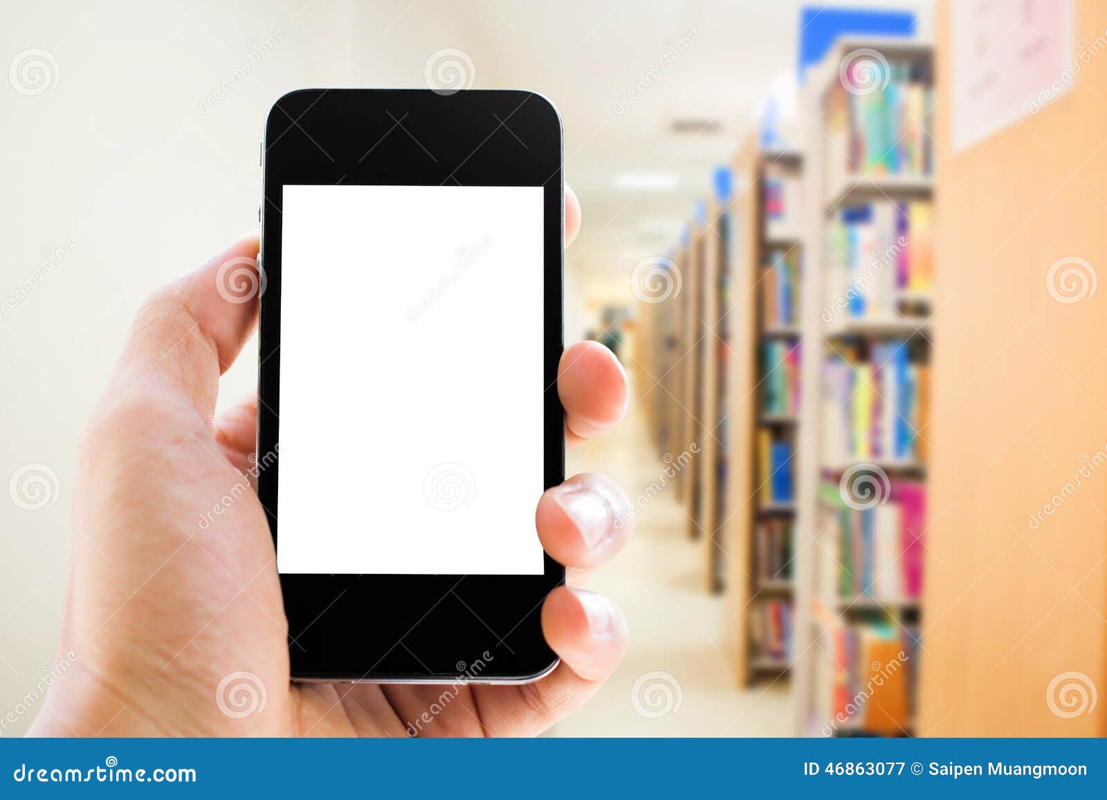 Hand holding smart phone stock image. Image of cell, bookshelf - 46863077