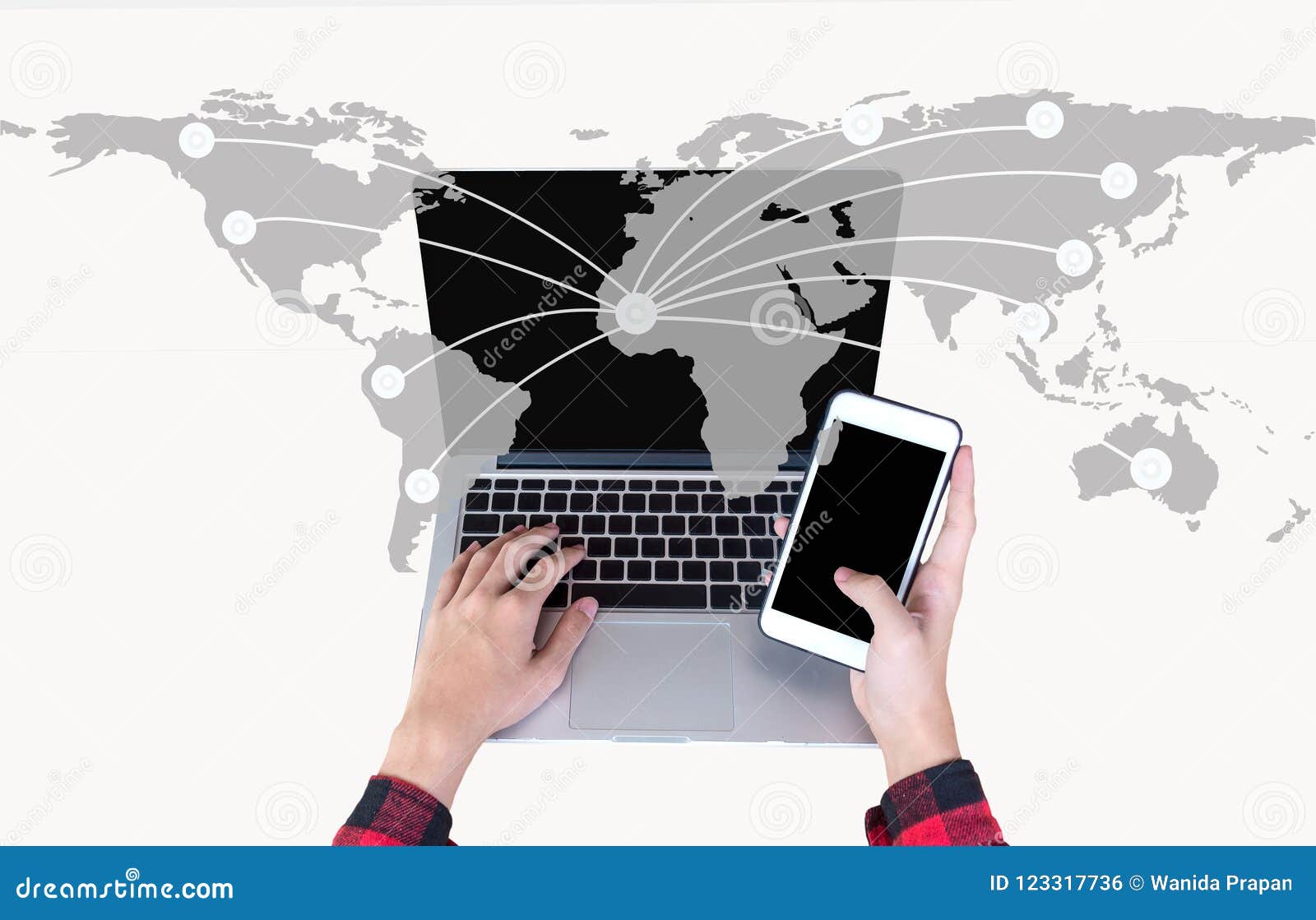 Hand Holding Smart Phone and Use Laptop Computer on World Map Network ...