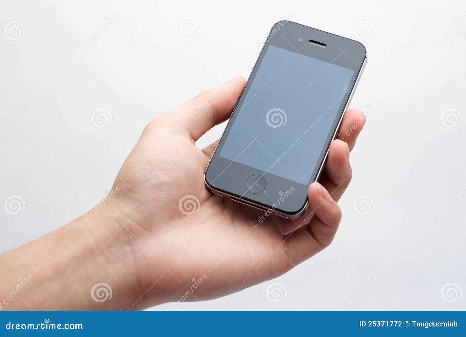 Hand holding smartphone stock photo. Image of network - 25371772