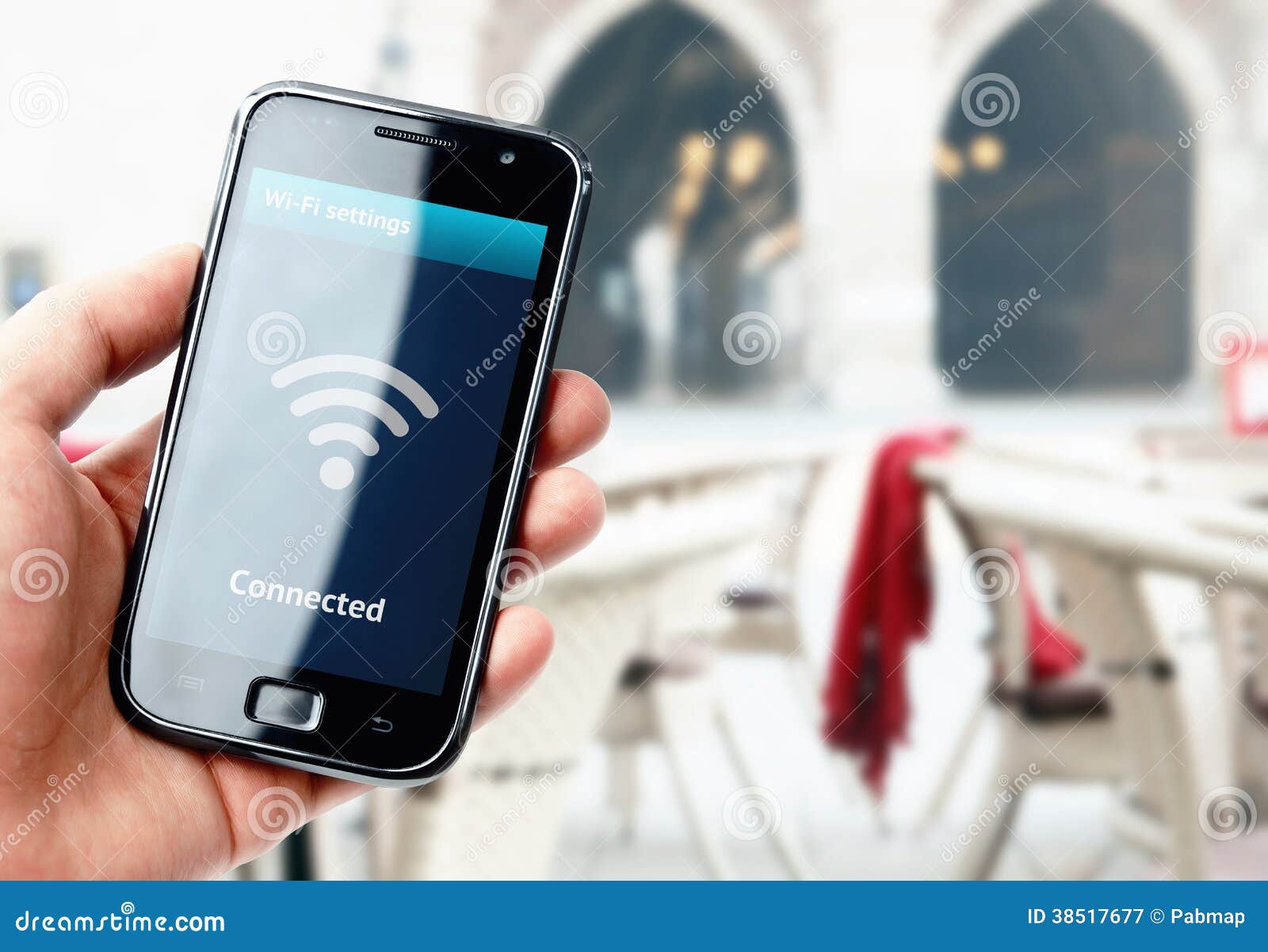 Hand Holding Smartphone with Wi-fi Connection in Cafe Stock Image ...