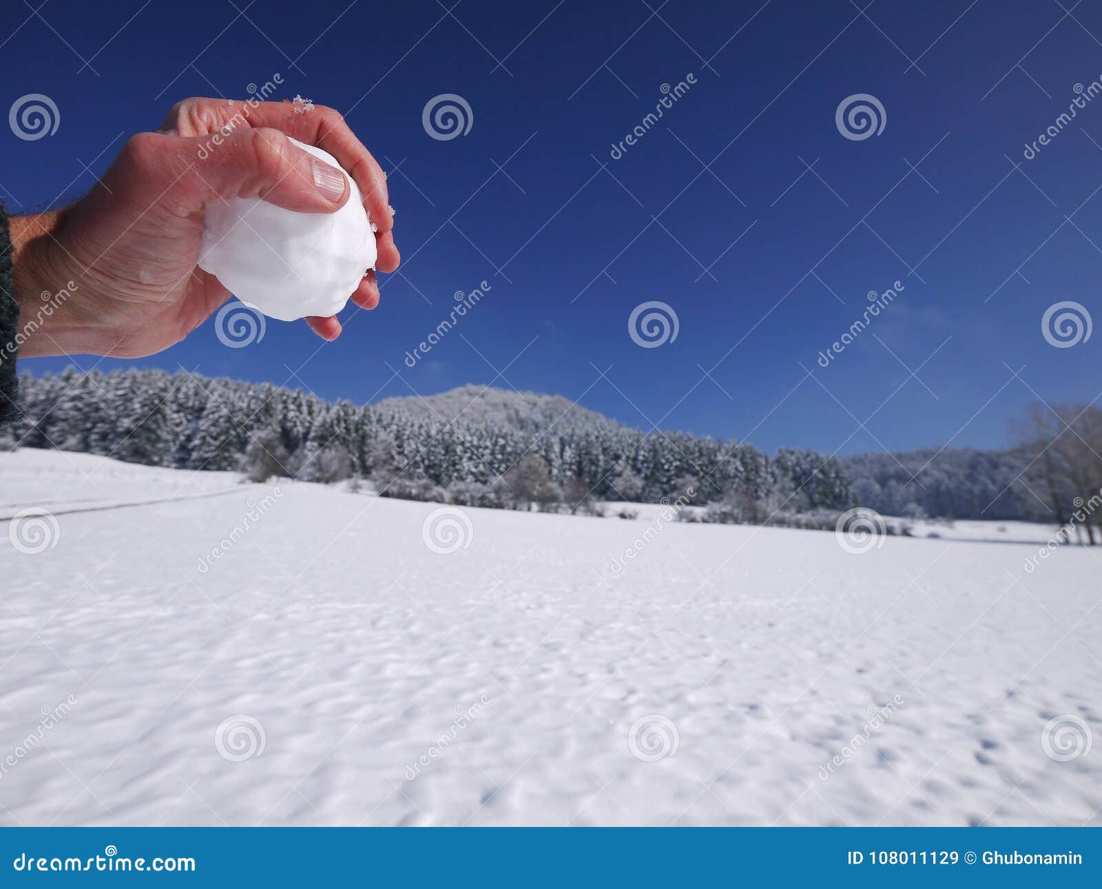 Hand holding snow ball stock image. Image of holiday - 108011129