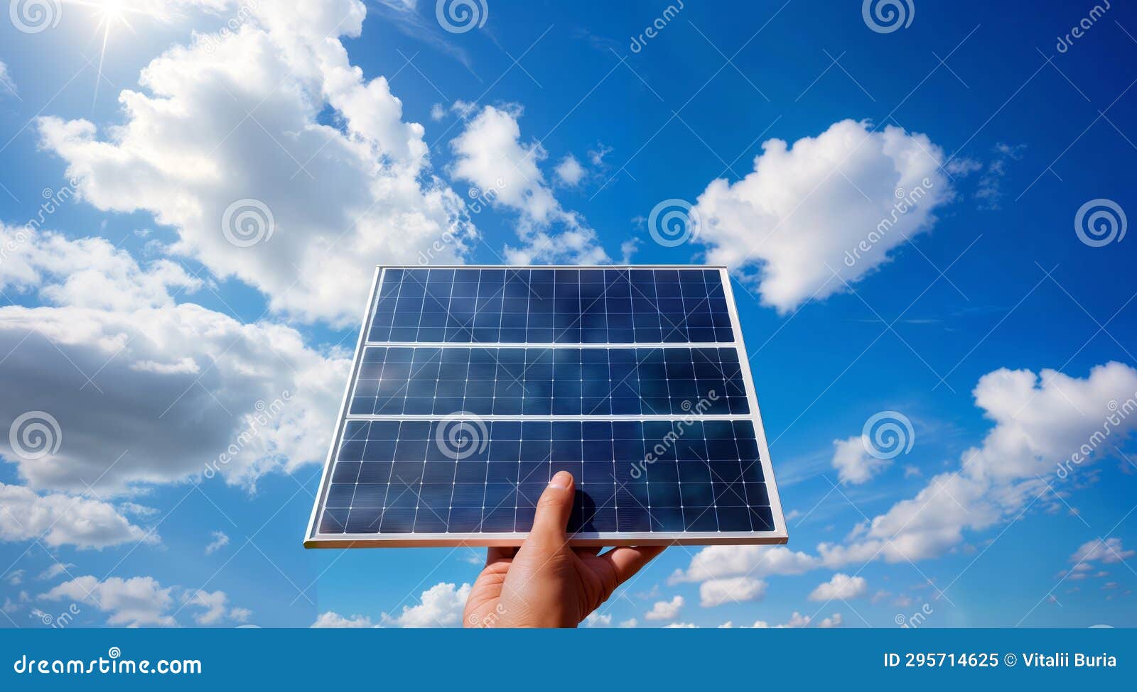 Hand Holding Solar Panel Against Blue Sky with White Clouds ...