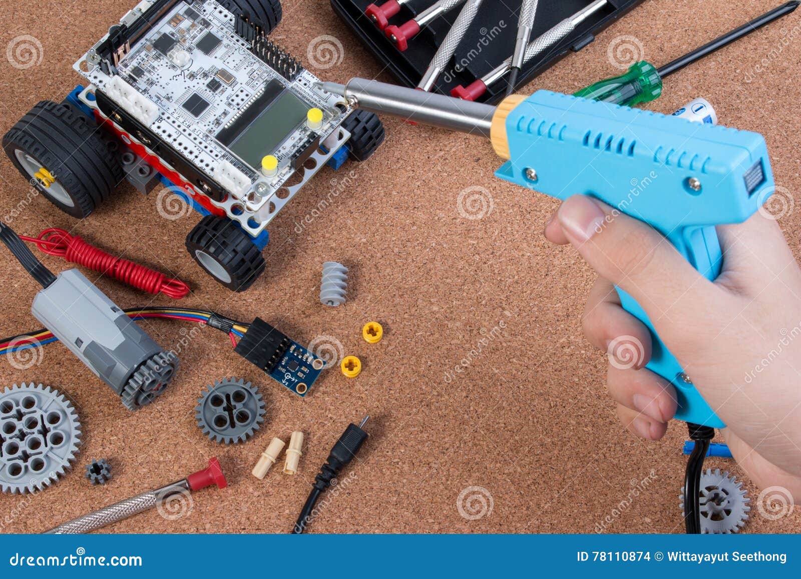 Hand Holding Soldering Iron Tool Assembling Robot Stock Photo - Image ...