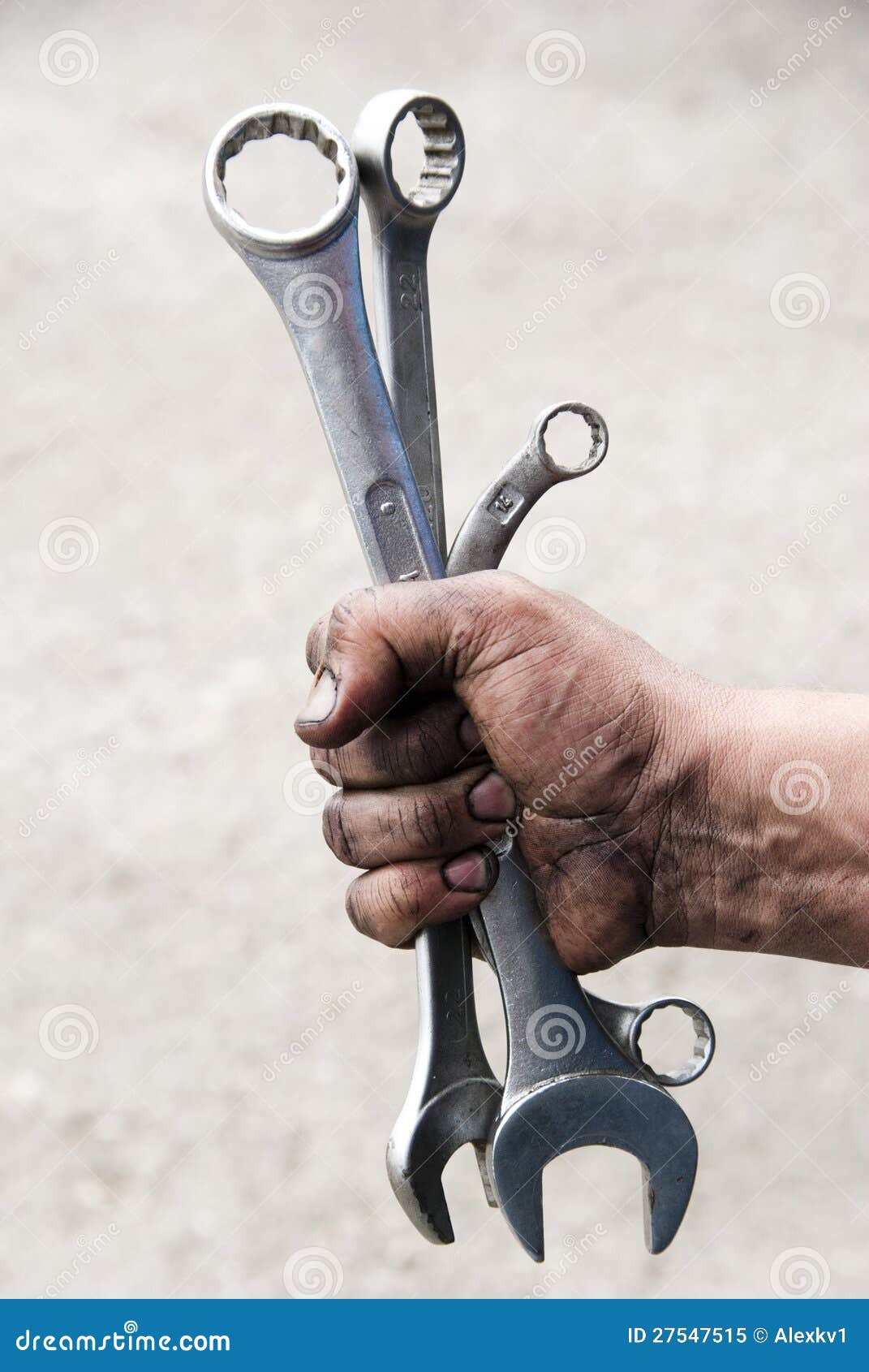Hand holding spanners stock image. Image of automobile - 27547515