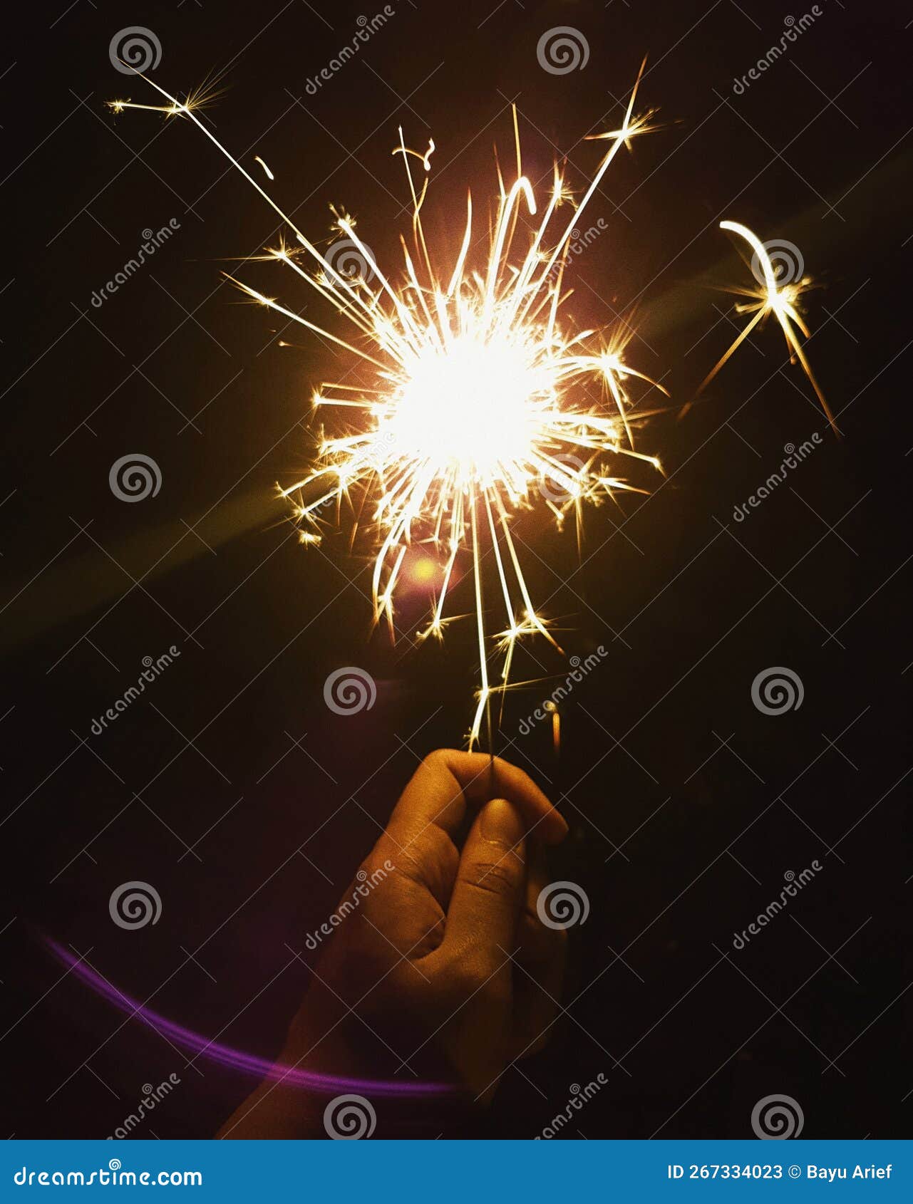 Hand Holding Sparkling Fireworks Stock Image - Image of flower ...