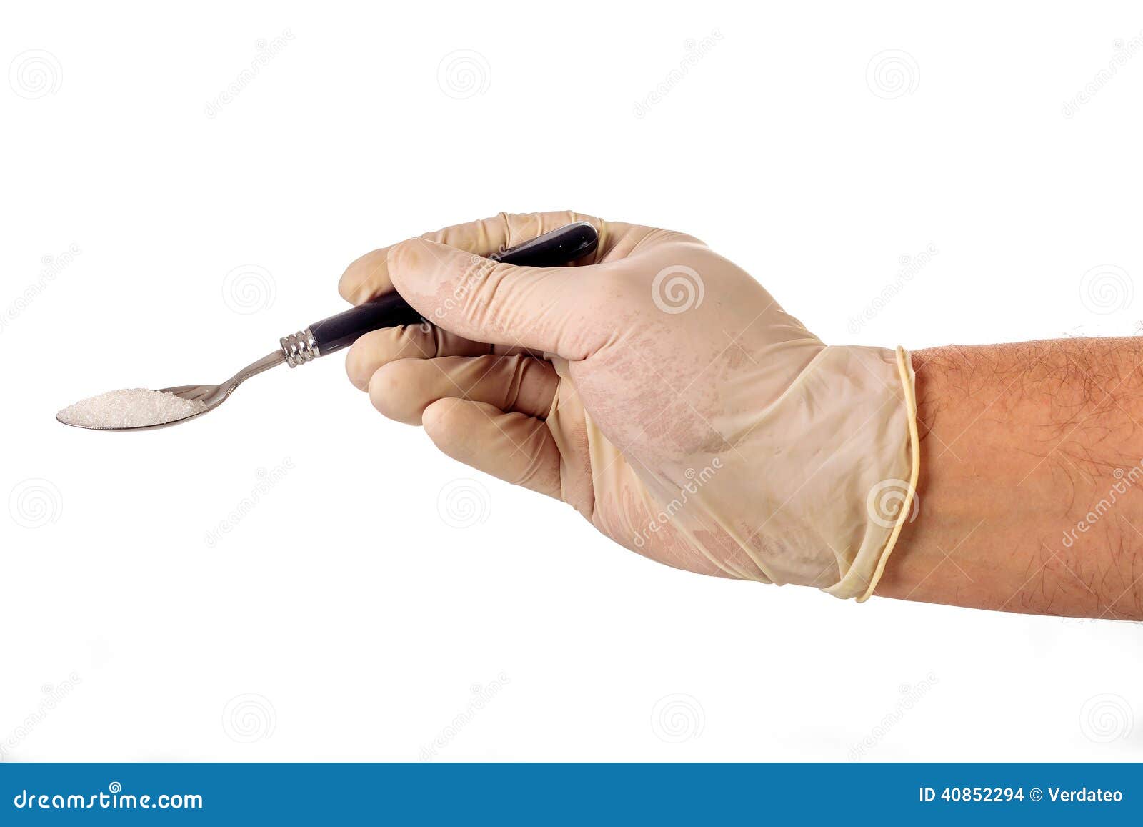 Hand holding spoon stock photo. Image of pile, energy - 40852294