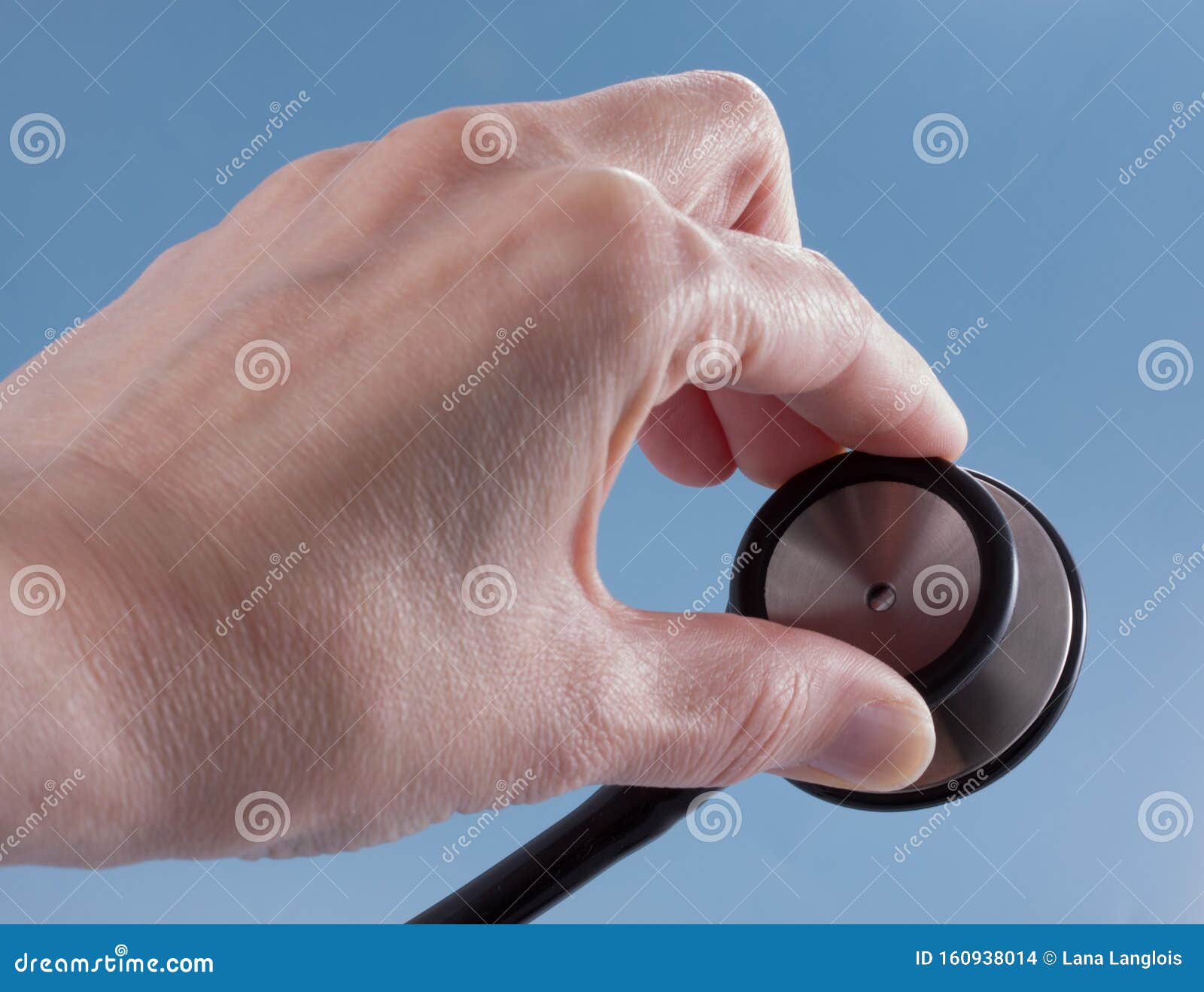 Hand Holding Stethoscope, Blue Background Stock Photo - Image of heath ...