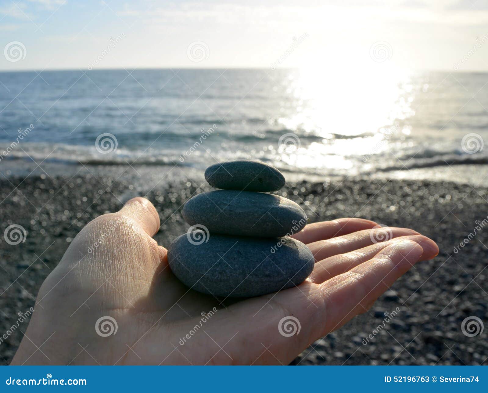 Hand holding stones. stock image. Image of hold, color - 52196763