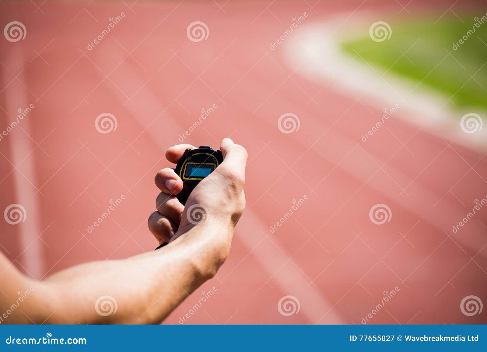 Hand holding a stopwatch stock image. Image of adult - 77655027