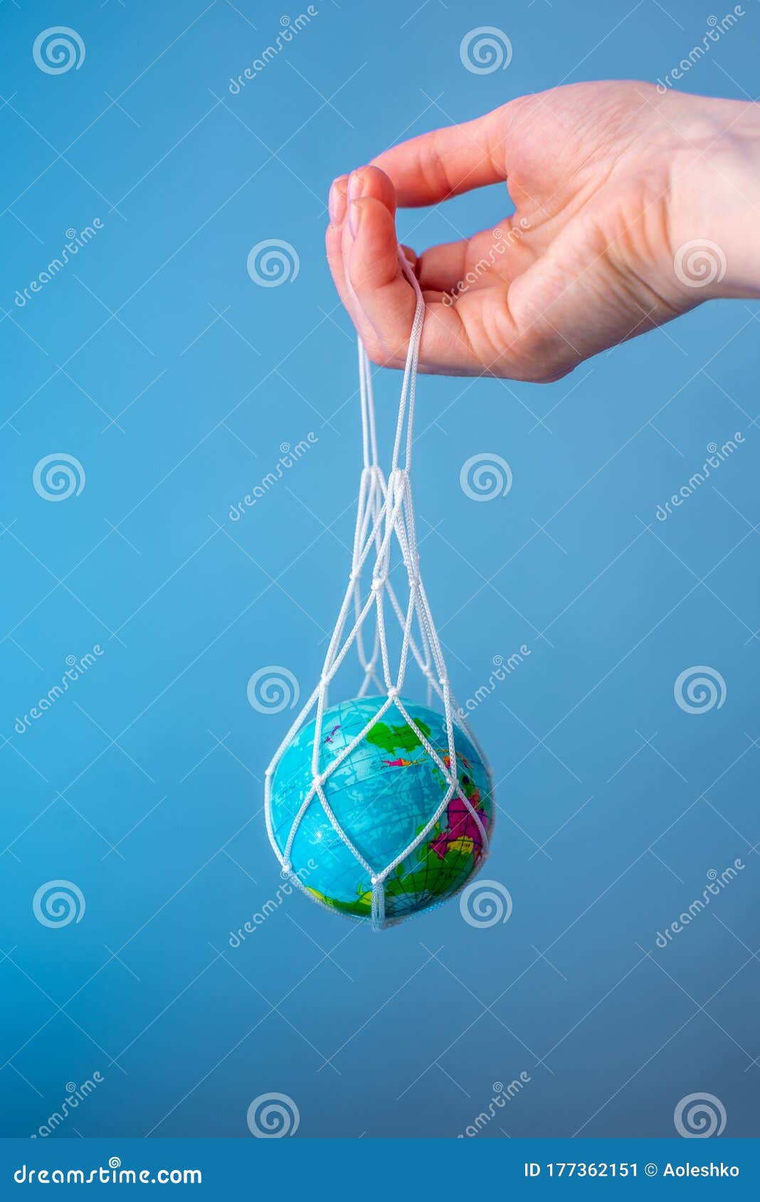 Hand Holding a String Bag with the Planet Earth. Caring for the ...