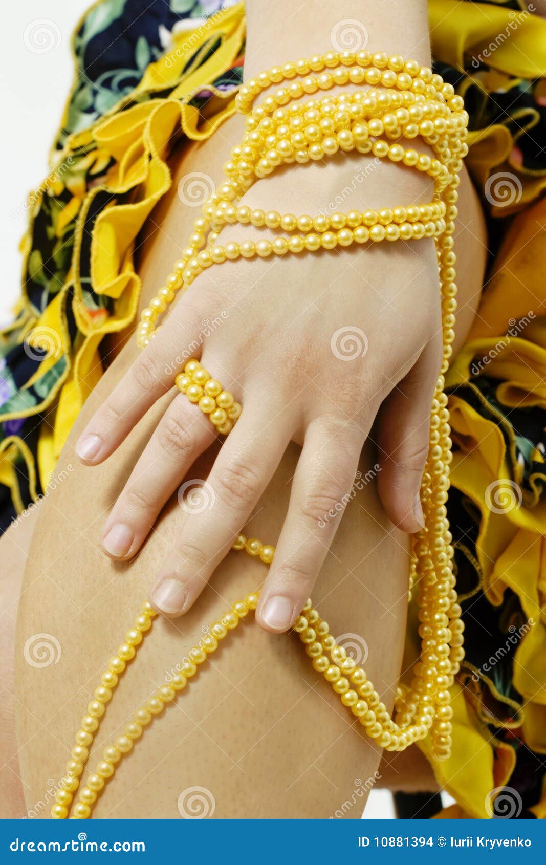 Hand Holding String of Yellow Pearls. Stock Photo - Image of artificial ...