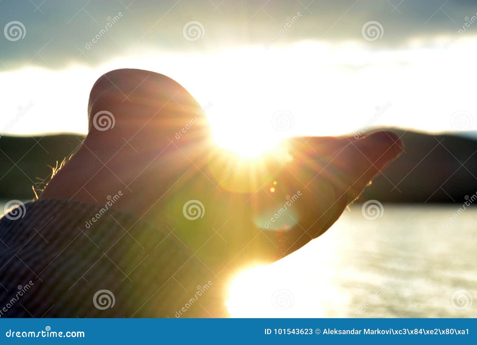 Hand holding the Sun stock image. Image of hand, peaceful - 101543623
