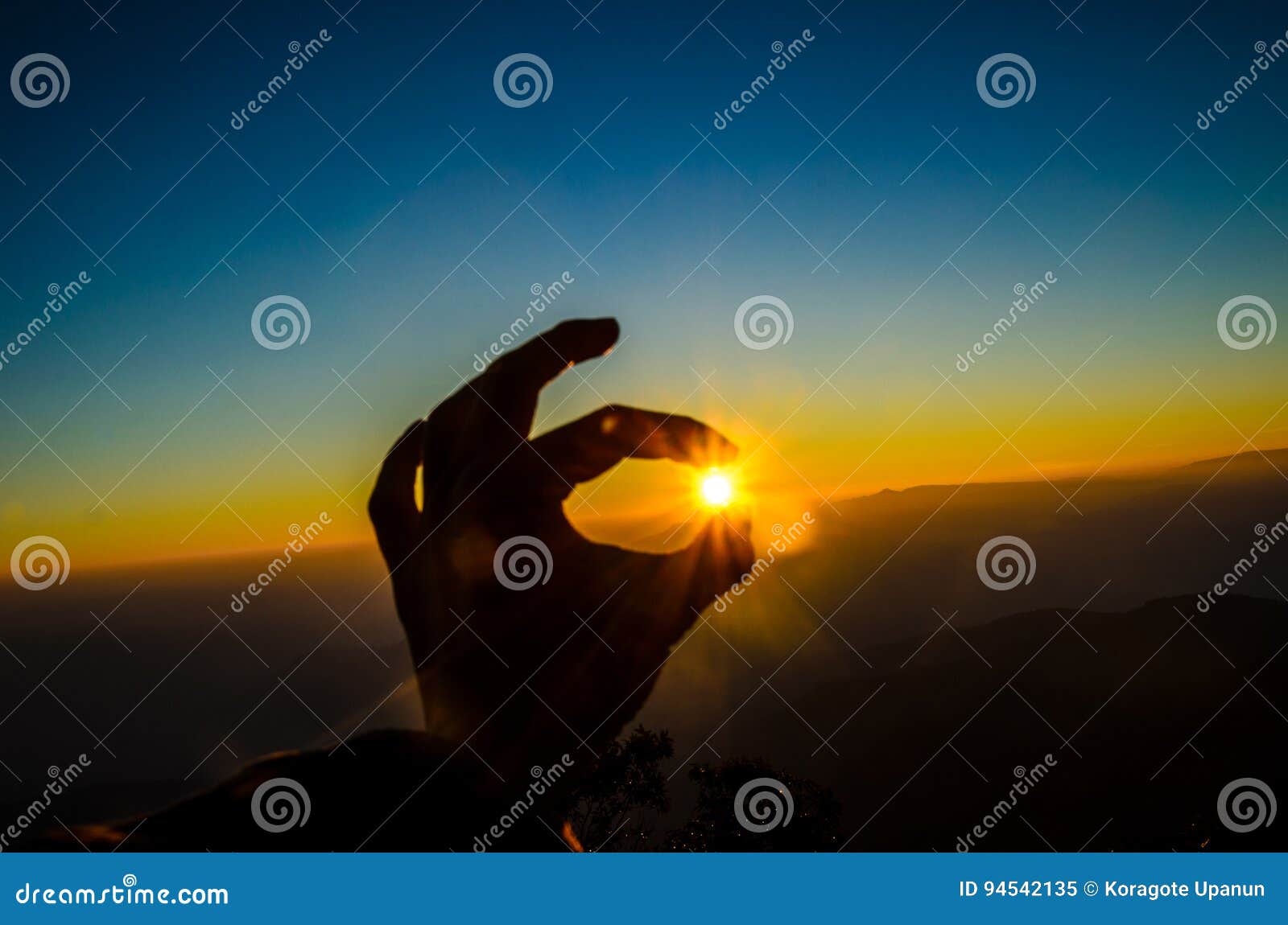 Hand Holding the Sun on Mountain Stock Image - Image of nature, shining ...