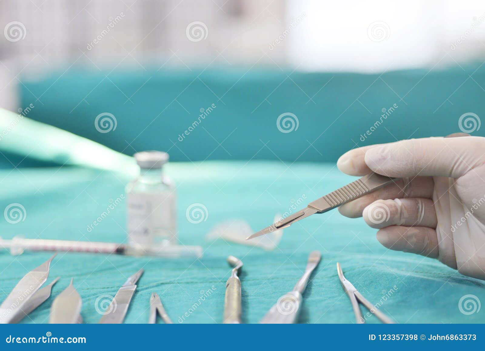Hand Holding Surgical Instruments Stock Photo - Image of color ...