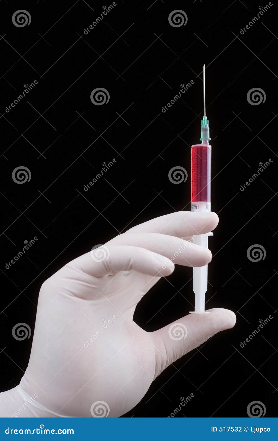 Hand holding a syringe stock photo. Image of genetic, healthcare - 517532