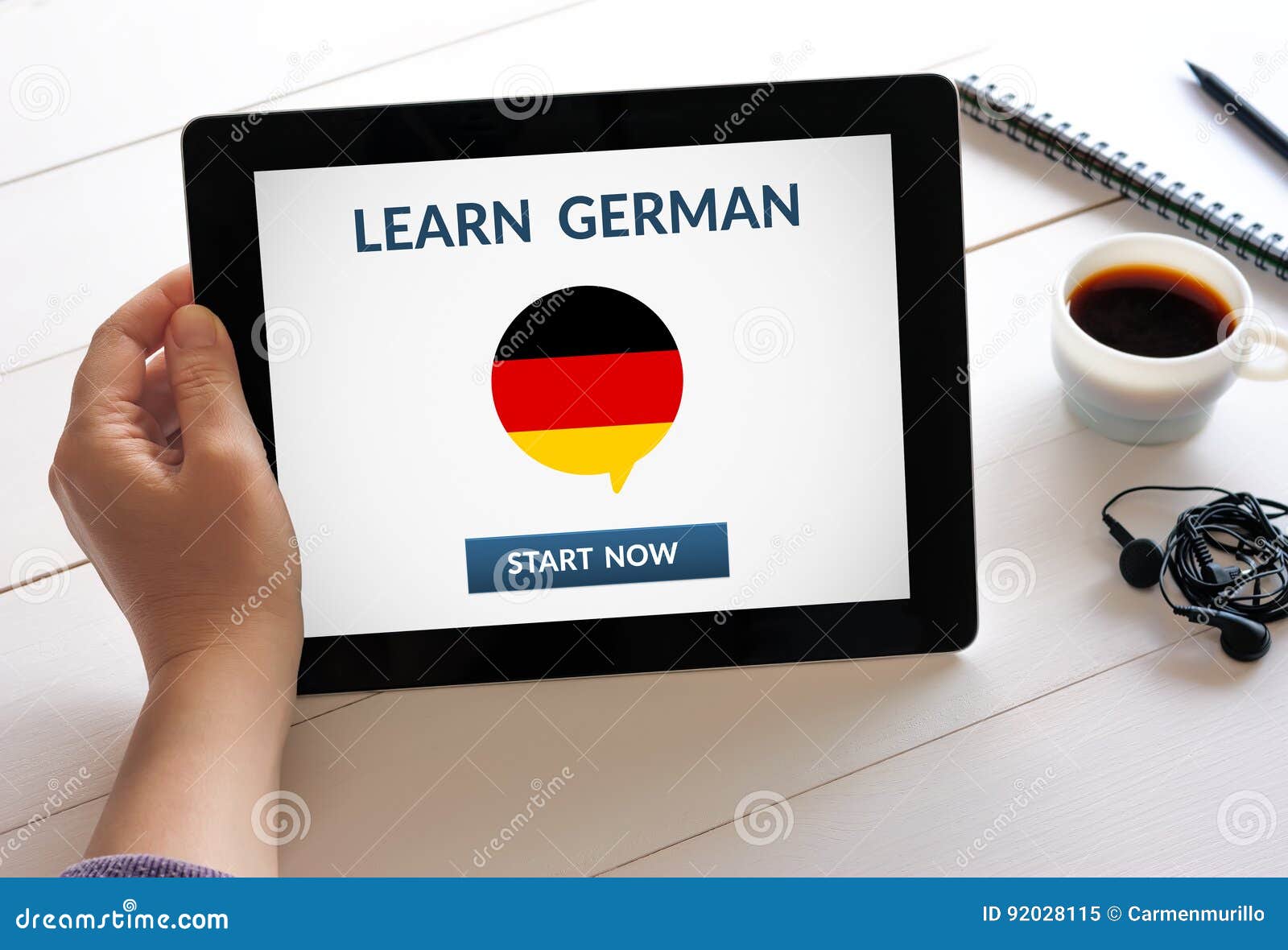 Hand Holding Tablet with Learn German Concept on Screen Stock Image ...