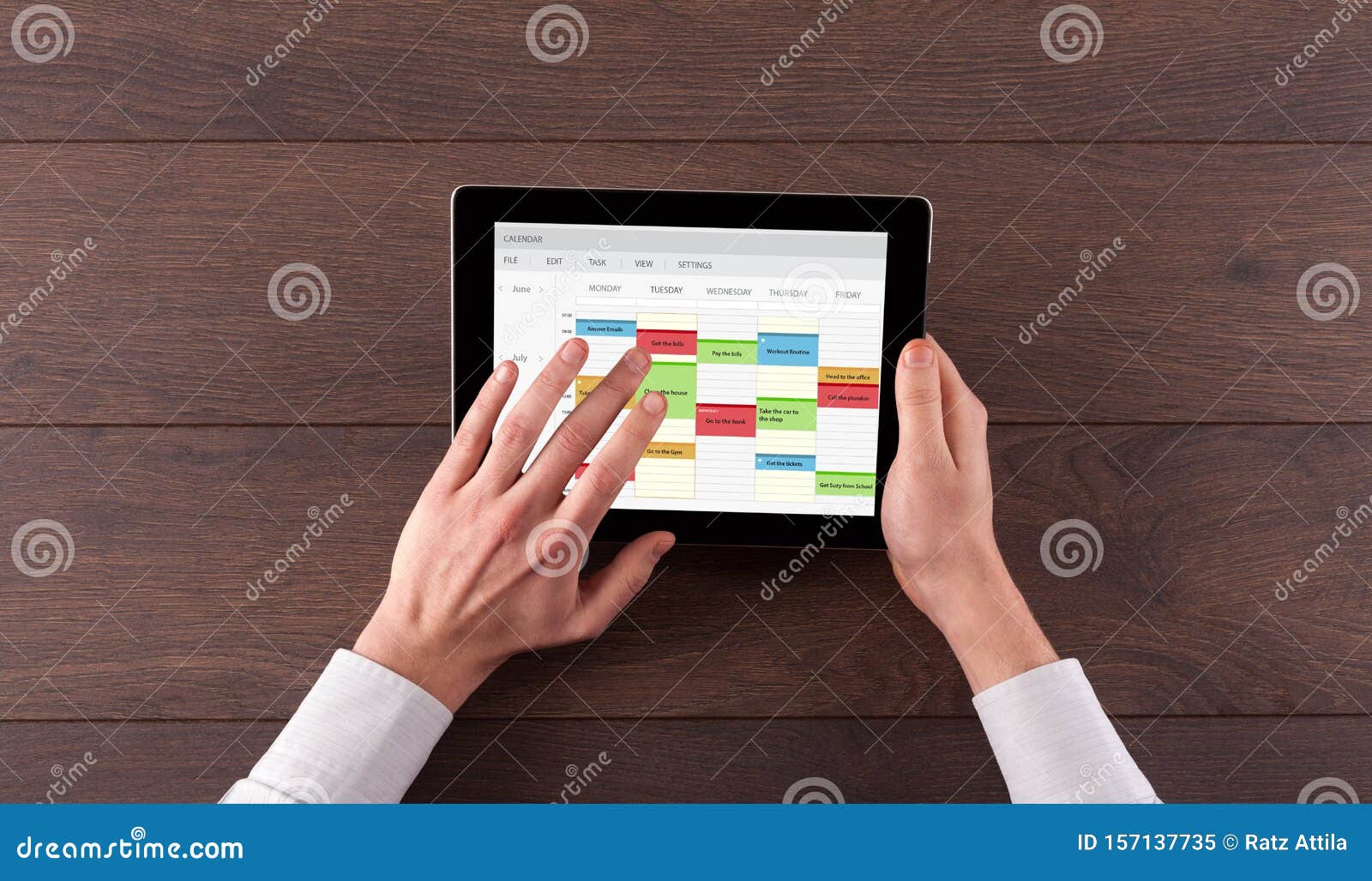 Hand Holding Tablet with Timetable Concept Stock Image - Image of ...