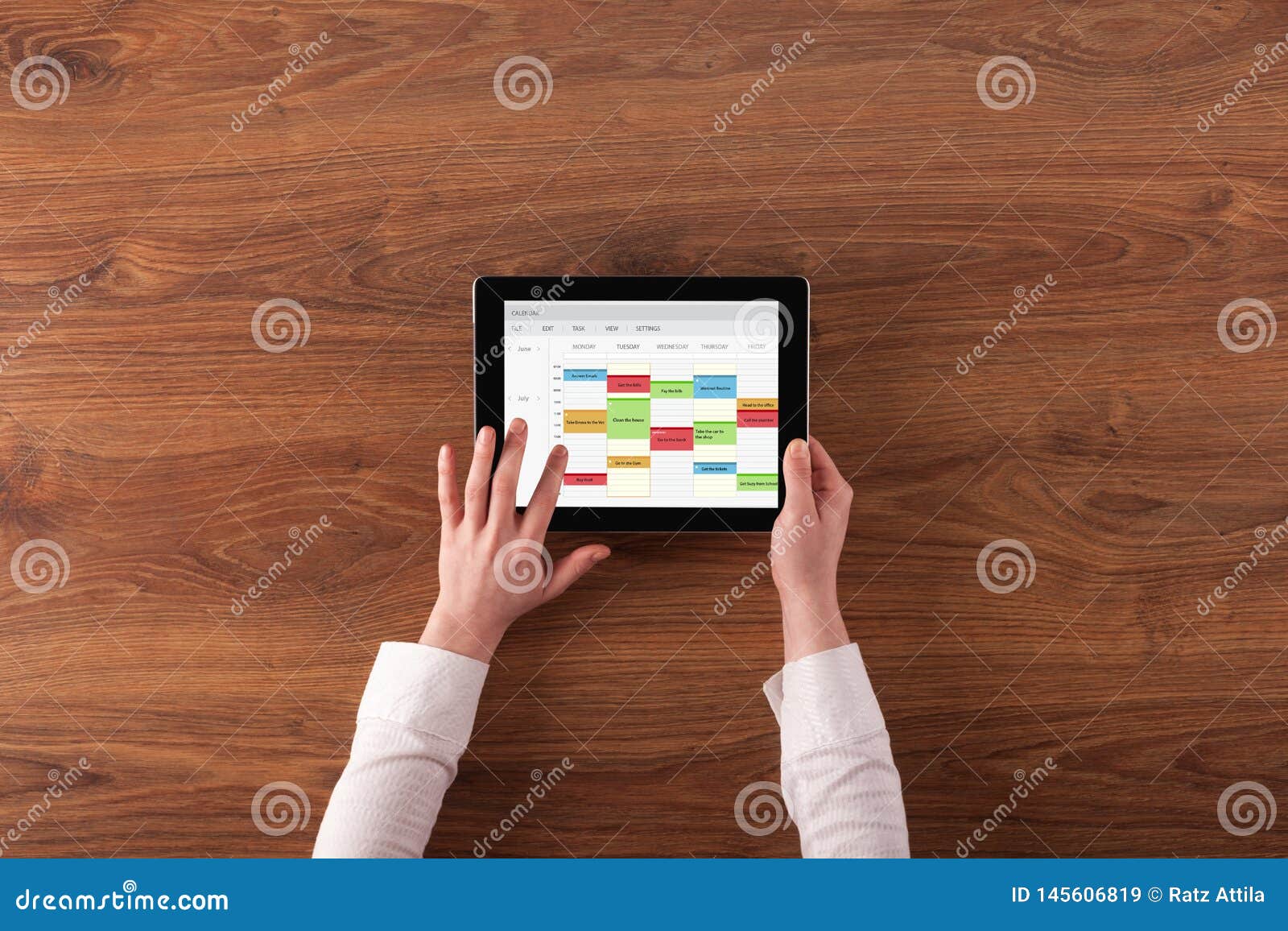 Hand Holding Tablet with Timetable Concept Stock Image - Image of ...
