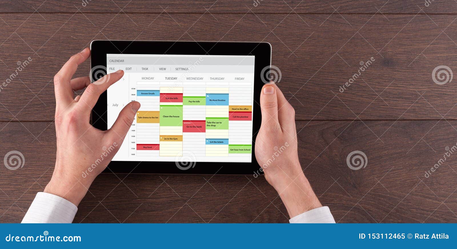 Hand Holding Tablet with Timetable Concept Stock Image - Image of ...