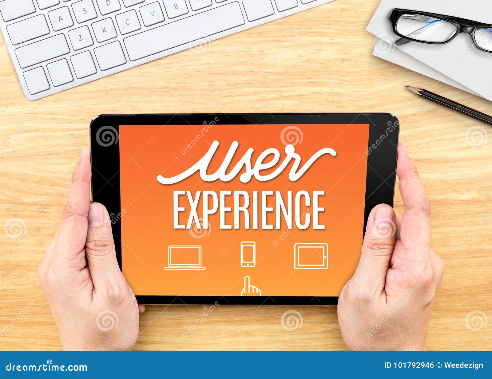 Hand Holding Tablet with User Experience Word on Wood Table ,Digital ...